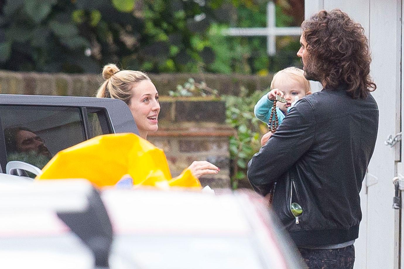 Russell Brand Shows Off His Sweet Side, Cradles Baby Girl During Family ...