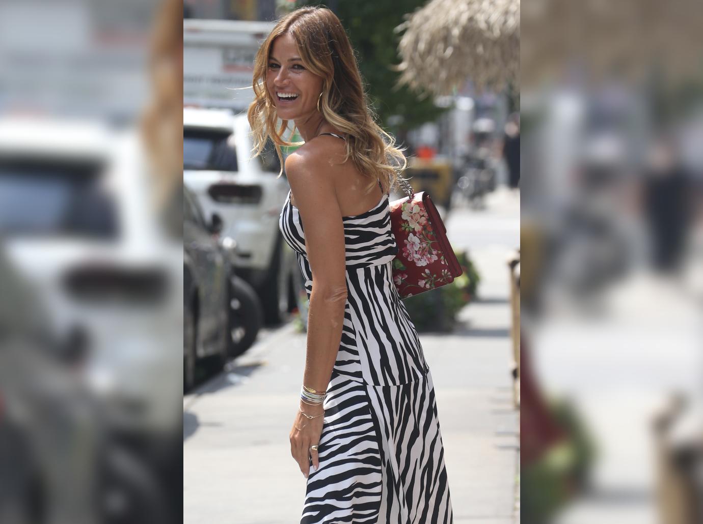 Ex-'RHONY' Star Kelly Bensimon Makes Leggy Appearance At Hamptons Hotspot