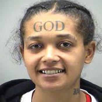 Now That's Not Very Christian! Woman With 'GOD' Face Tattoo Arrested ...